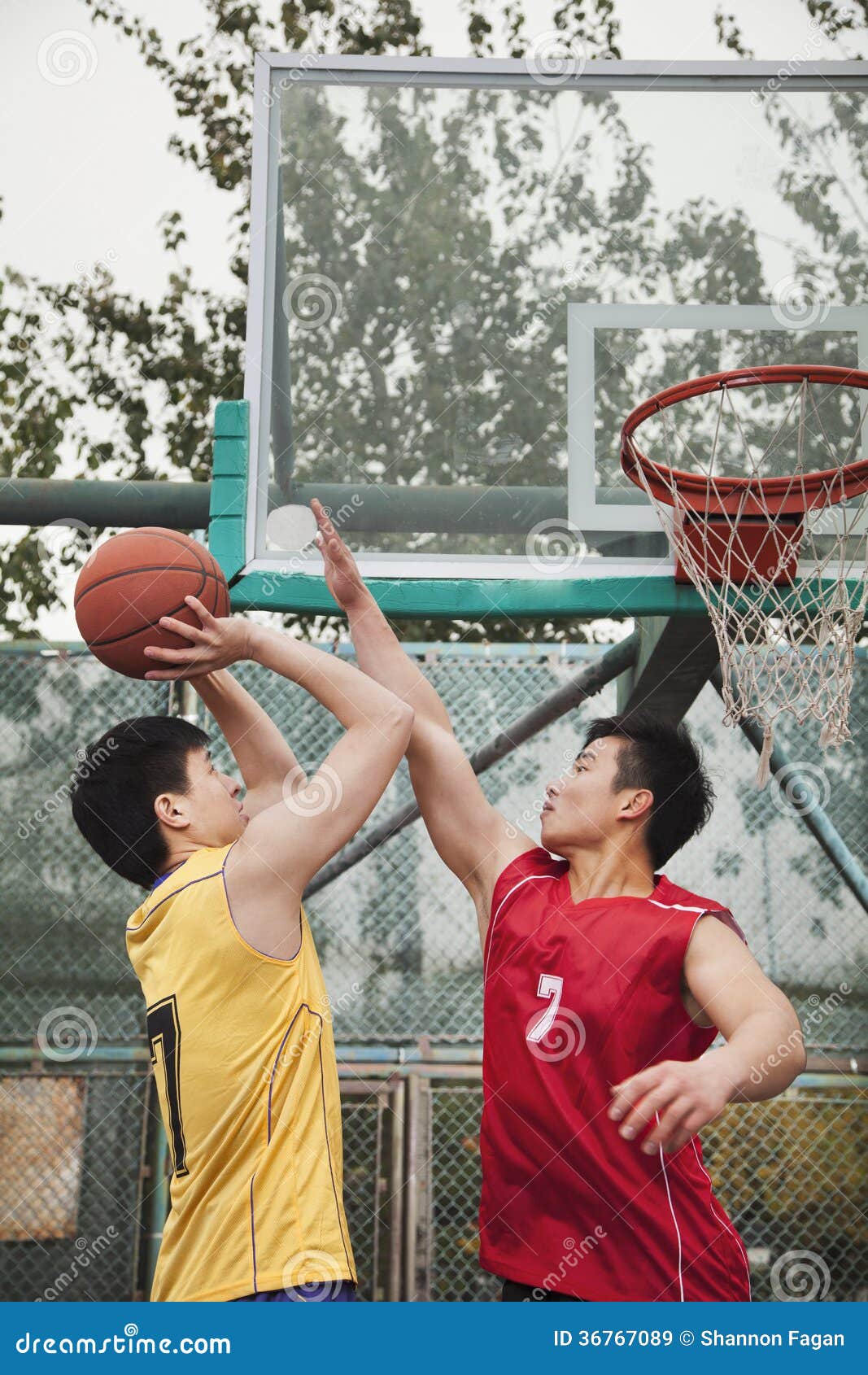 Two People Playing Basket Ball Stock Image - Image of city, control ...
