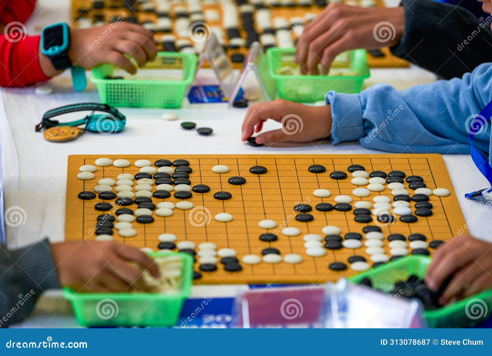 Two People are Playing Go in a Competition, Go Match Scene Stock Image ...