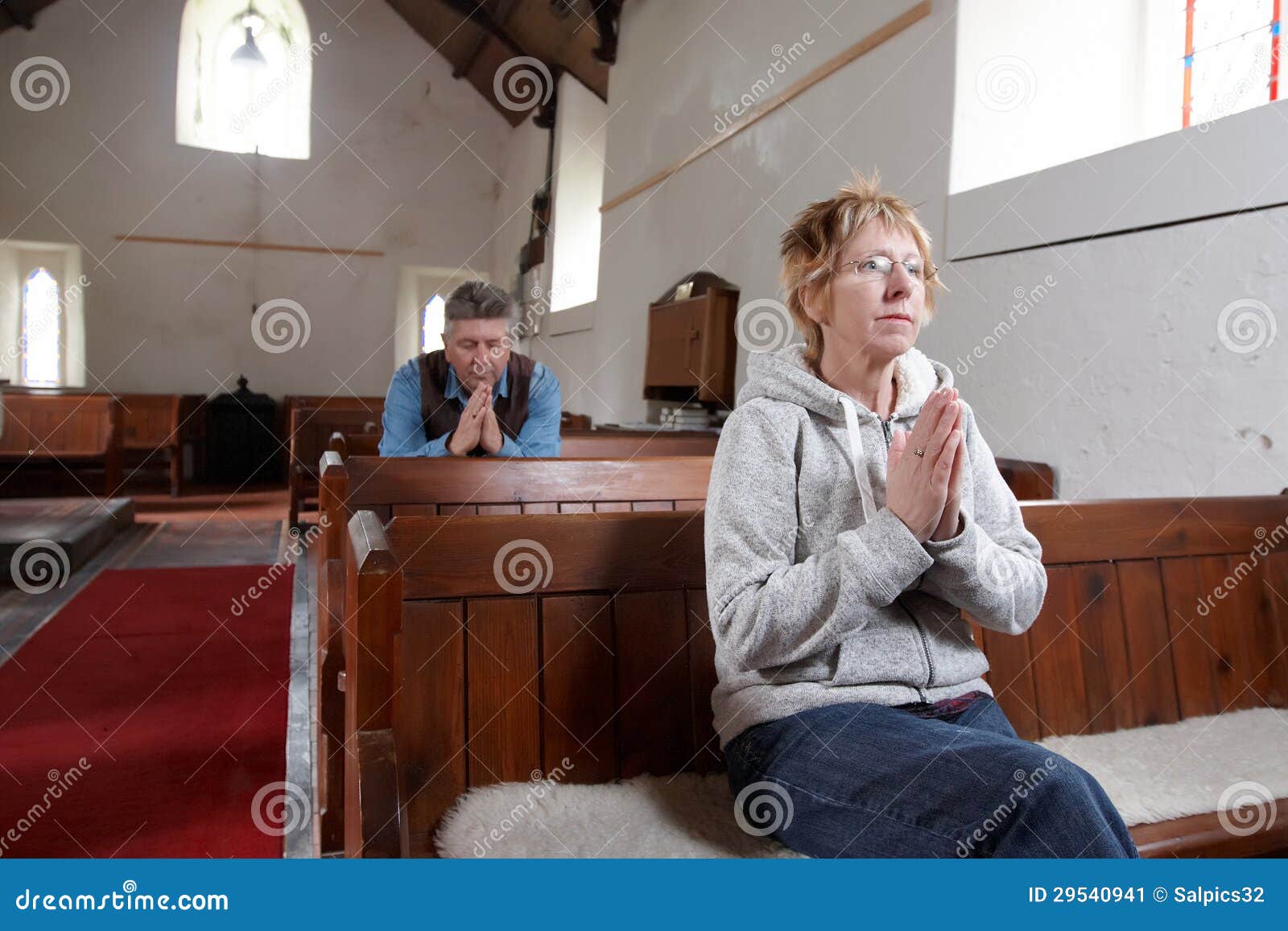 Two people praying stock image. Image of worship, people - 29540941