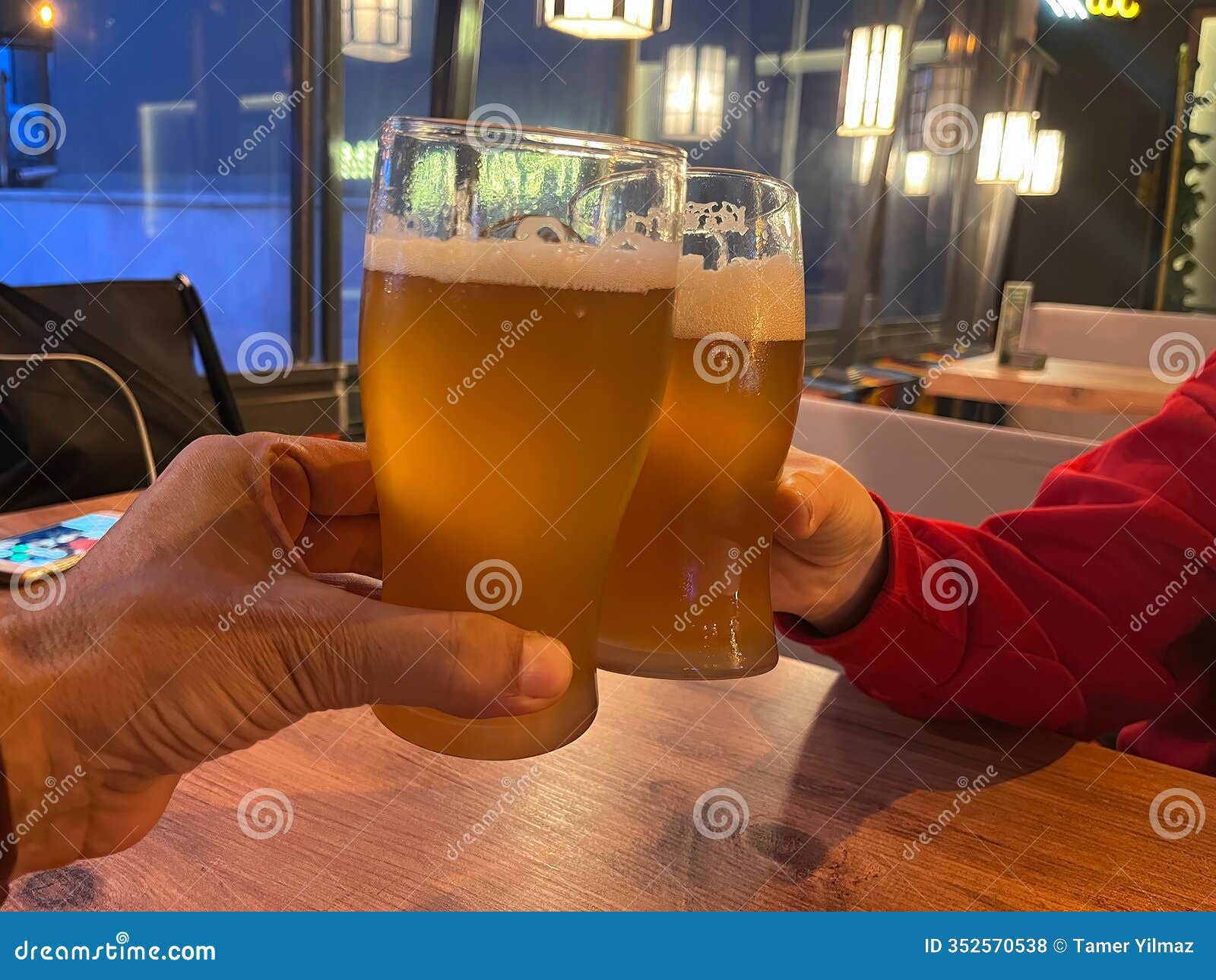 Two People in a Pub, Drinking a Beer Stock Photo - Image of people ...
