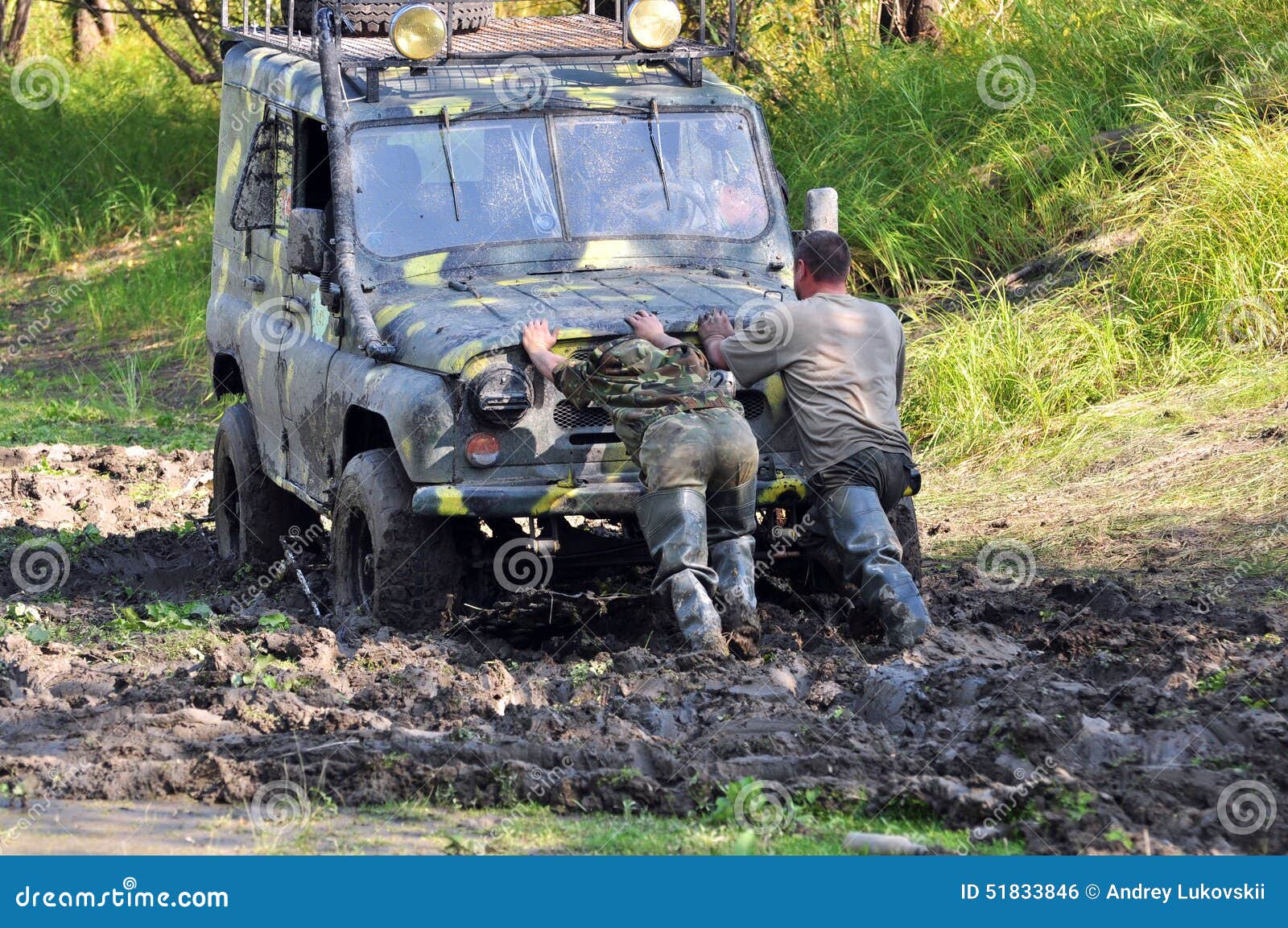 Two People Pull Out a Stuck Editorial Photo - Image of extreme, travel ...