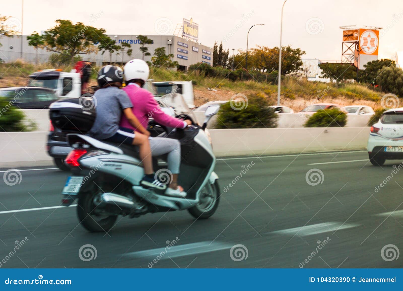 Two People Riding a Motorcycle with an Effect of Motion Editorial Image ...