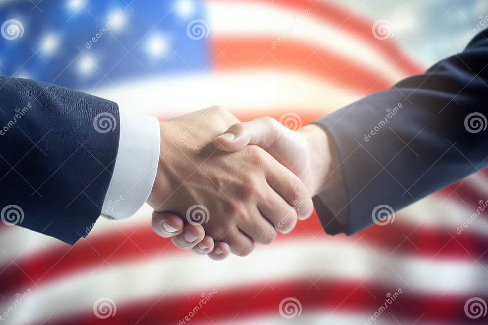 Two People Shake Hands Against the Backdrop of the American Flag ...