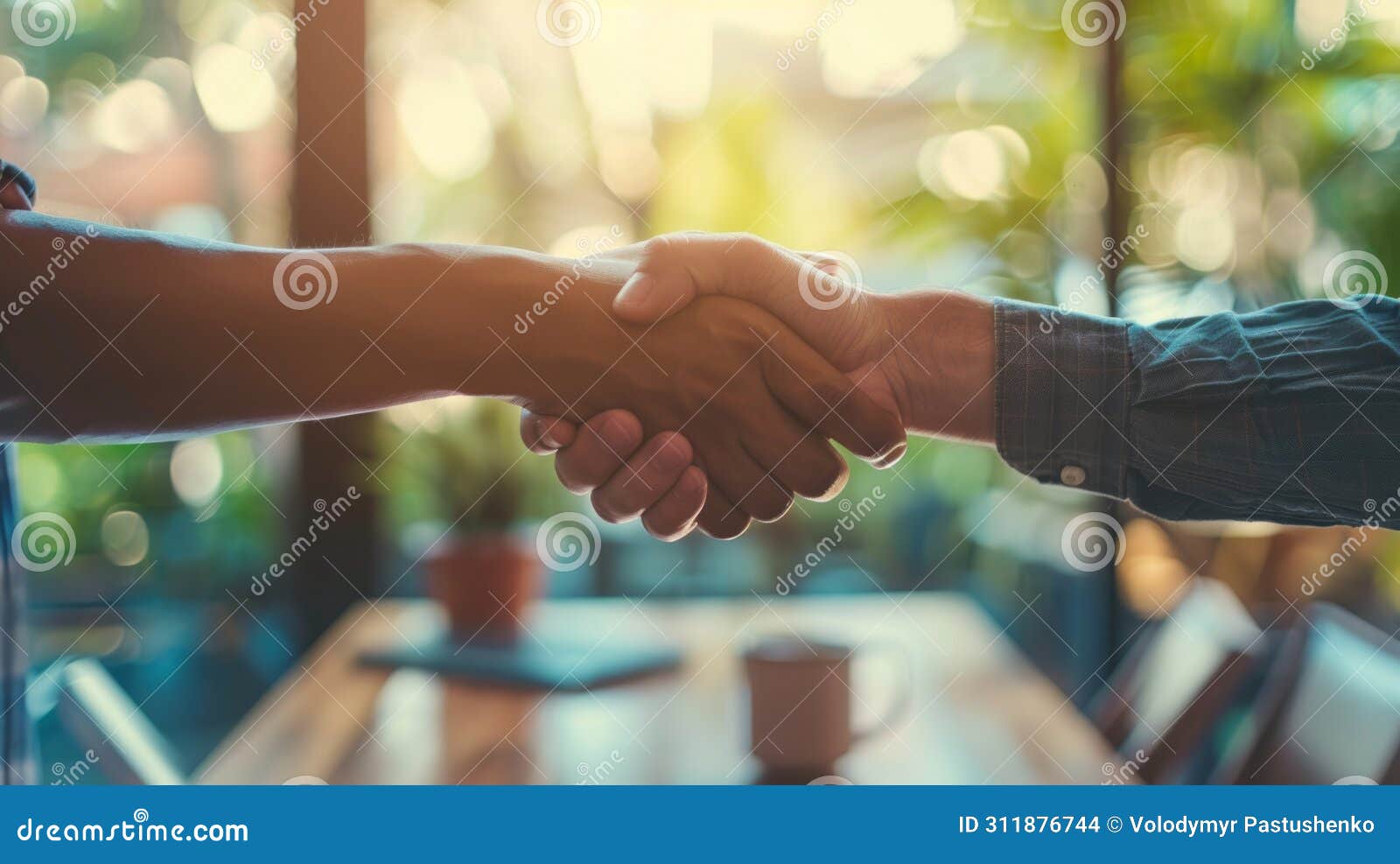 Two People Shaking Hands Over Table Stock Photo - Image of people ...