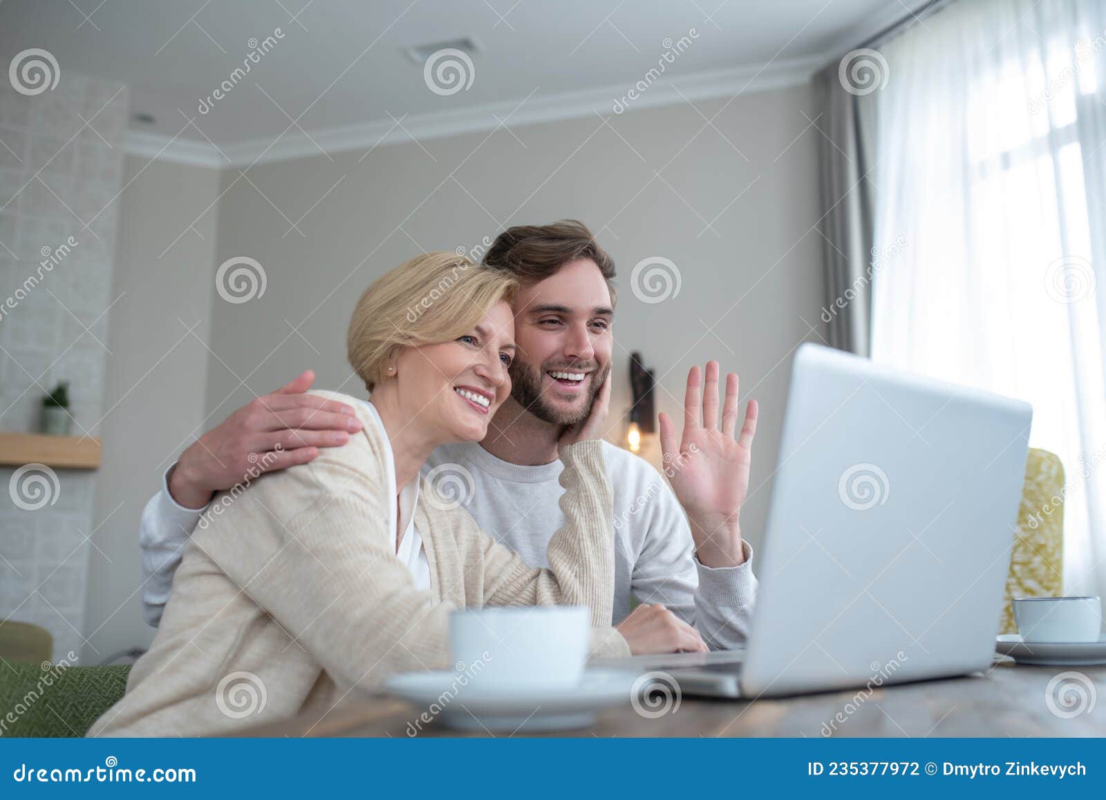 Two People Siiting at the Laptop and Having a Videp Call Stock Photo ...