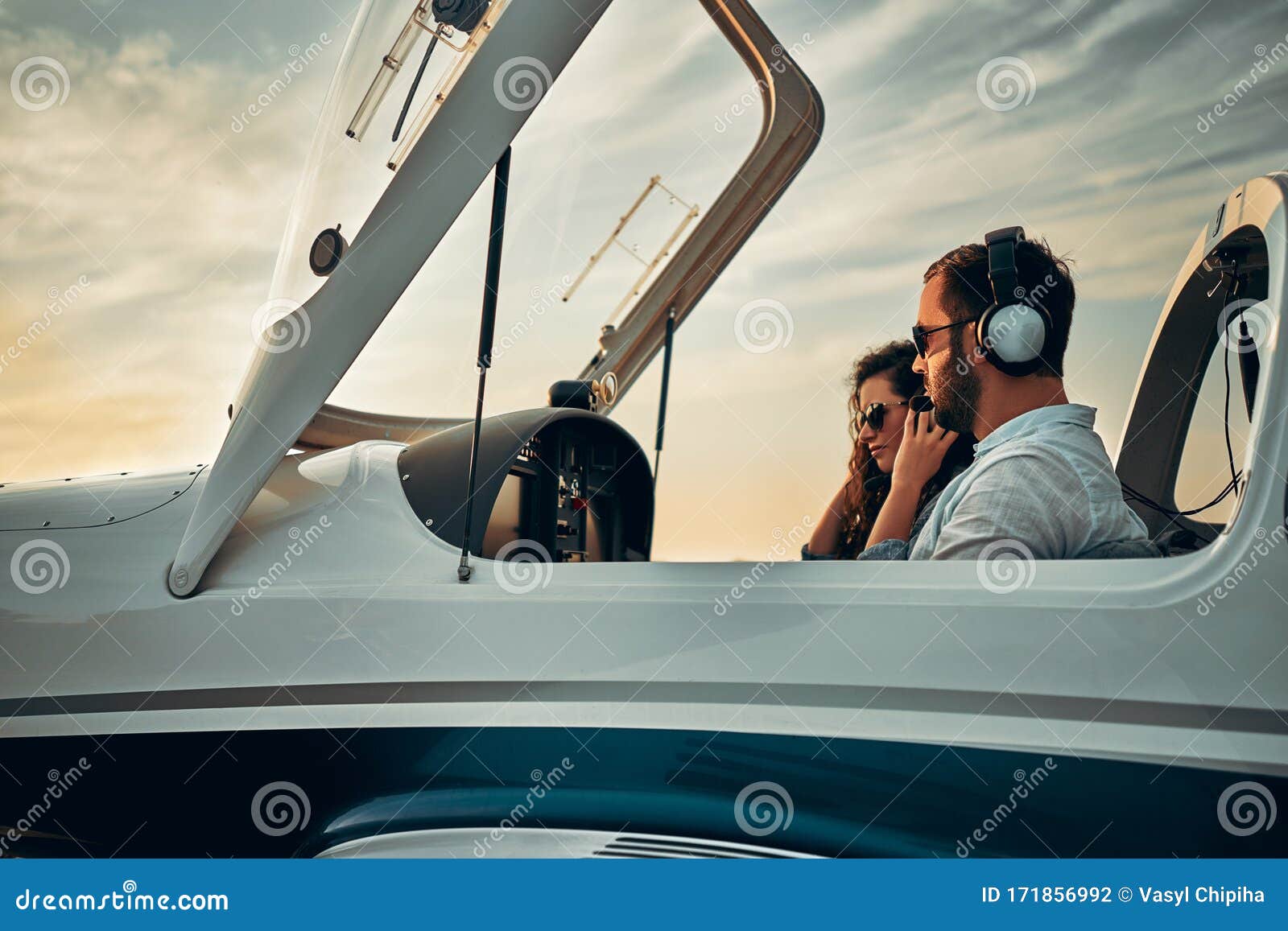 Two People Sit into Ultralight Propeller-driven Airplane and Get Ready ...