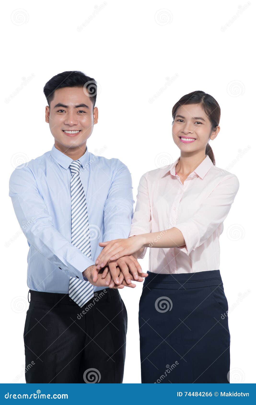 Two People Standing with Their Hands on Top Each Other and Smiling ...