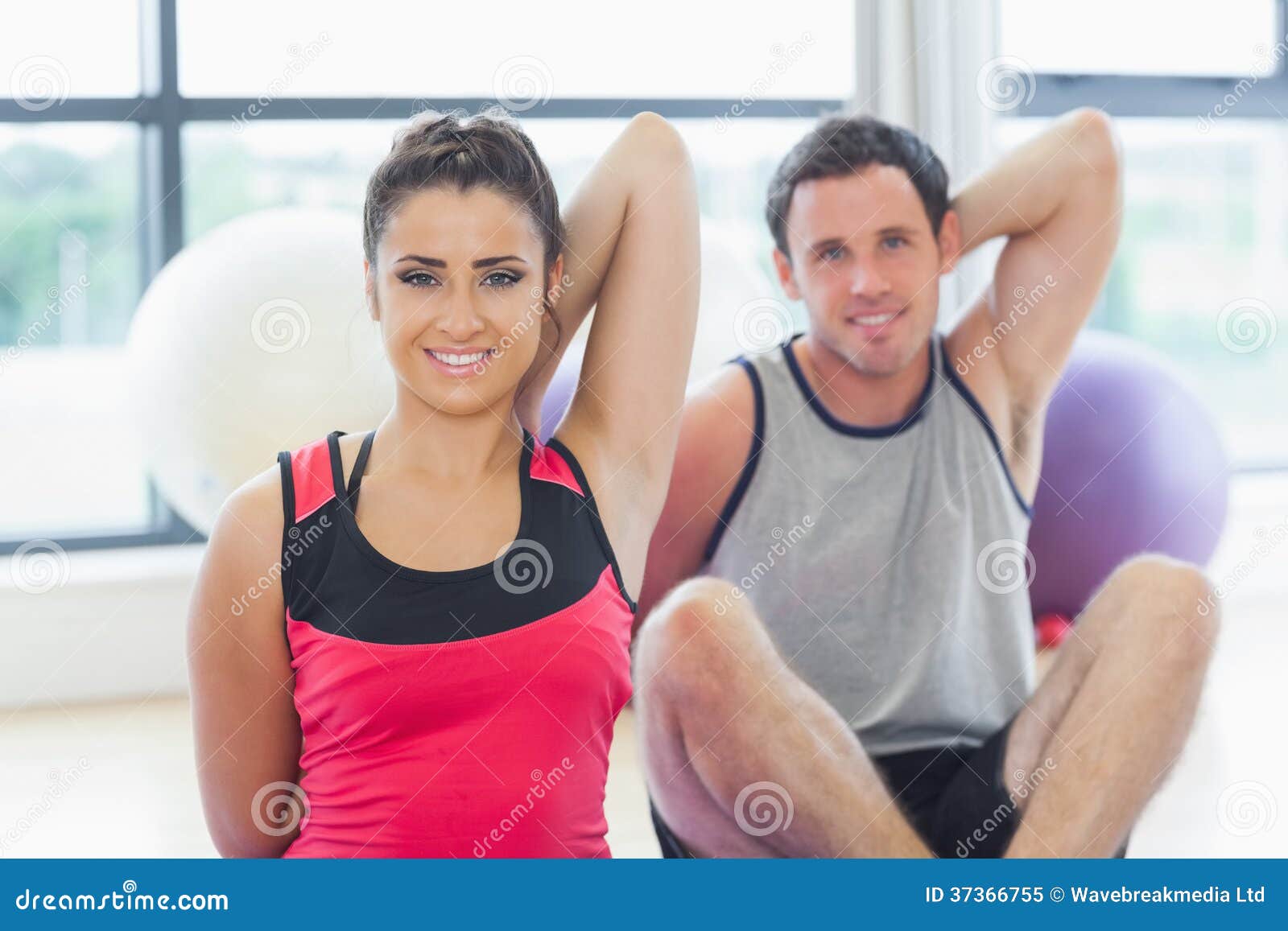 Two People Stretching Hands Back Behind at Yoga Class Stock Image ...