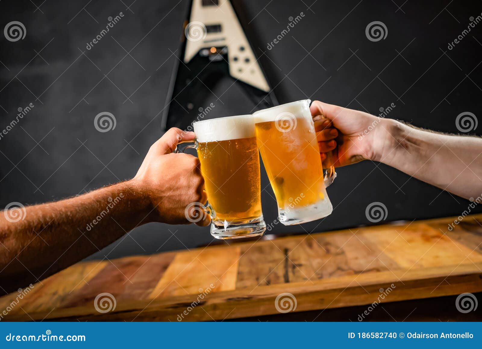 Two Mugs Full Of Chopp, With Chopp Pilsen On A Rustic Table. Stock ...