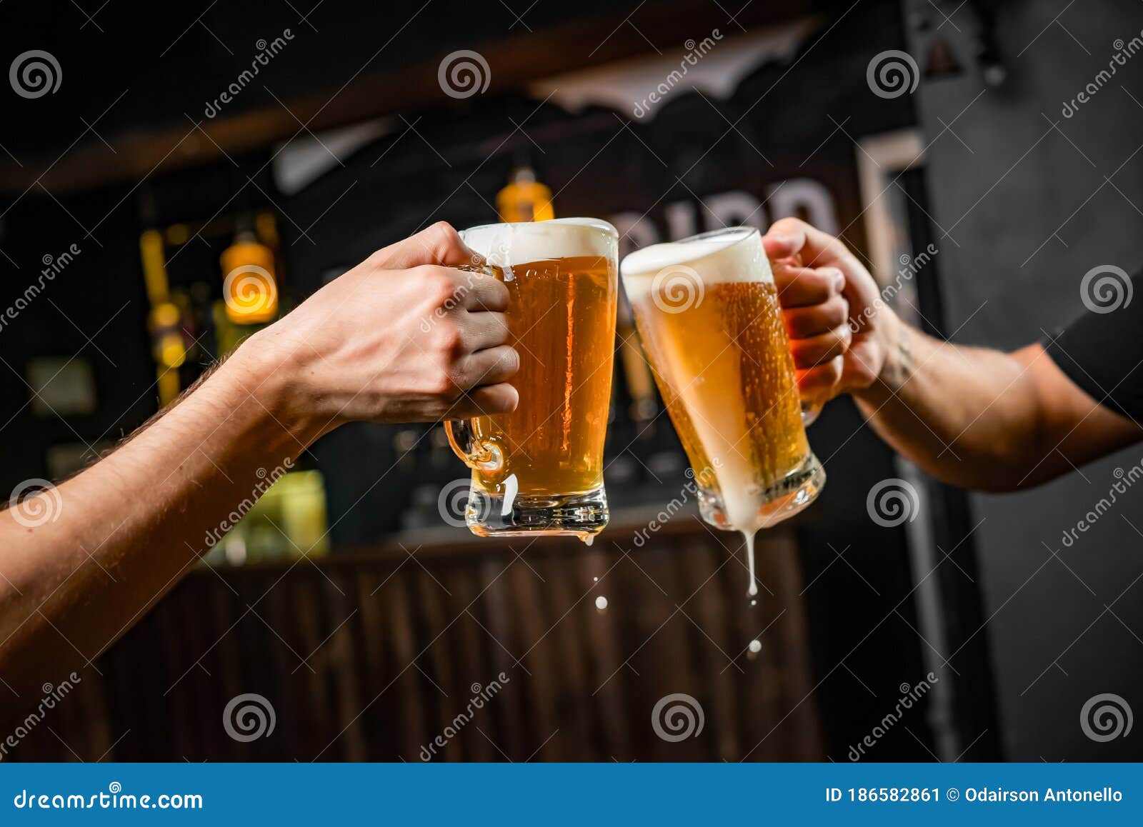 Two Mugs Full Of Chopp, With Chopp Pilsen On A Rustic Table. Stock ...