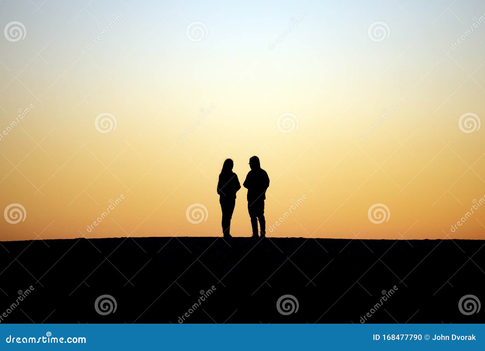 Two People Together at Sunset Stock Photo - Image of sunset, love ...