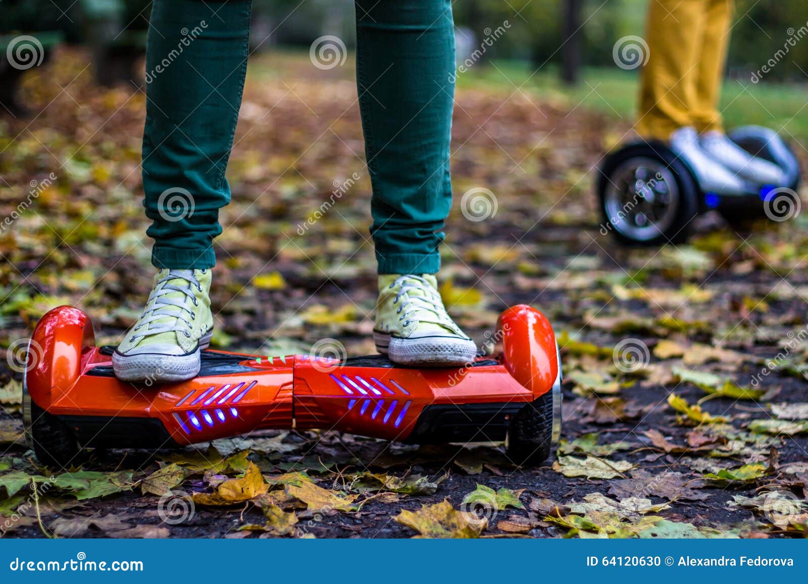 Two People are Using Hoverboards Stock Photo - Image of gyro, rolling ...