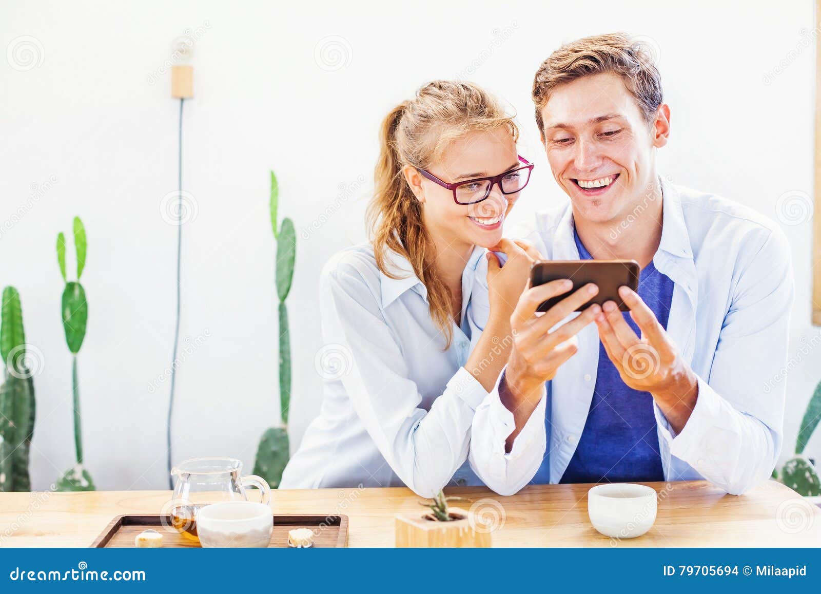Two People Using a Smartphone Stock Photo - Image of intruder ...
