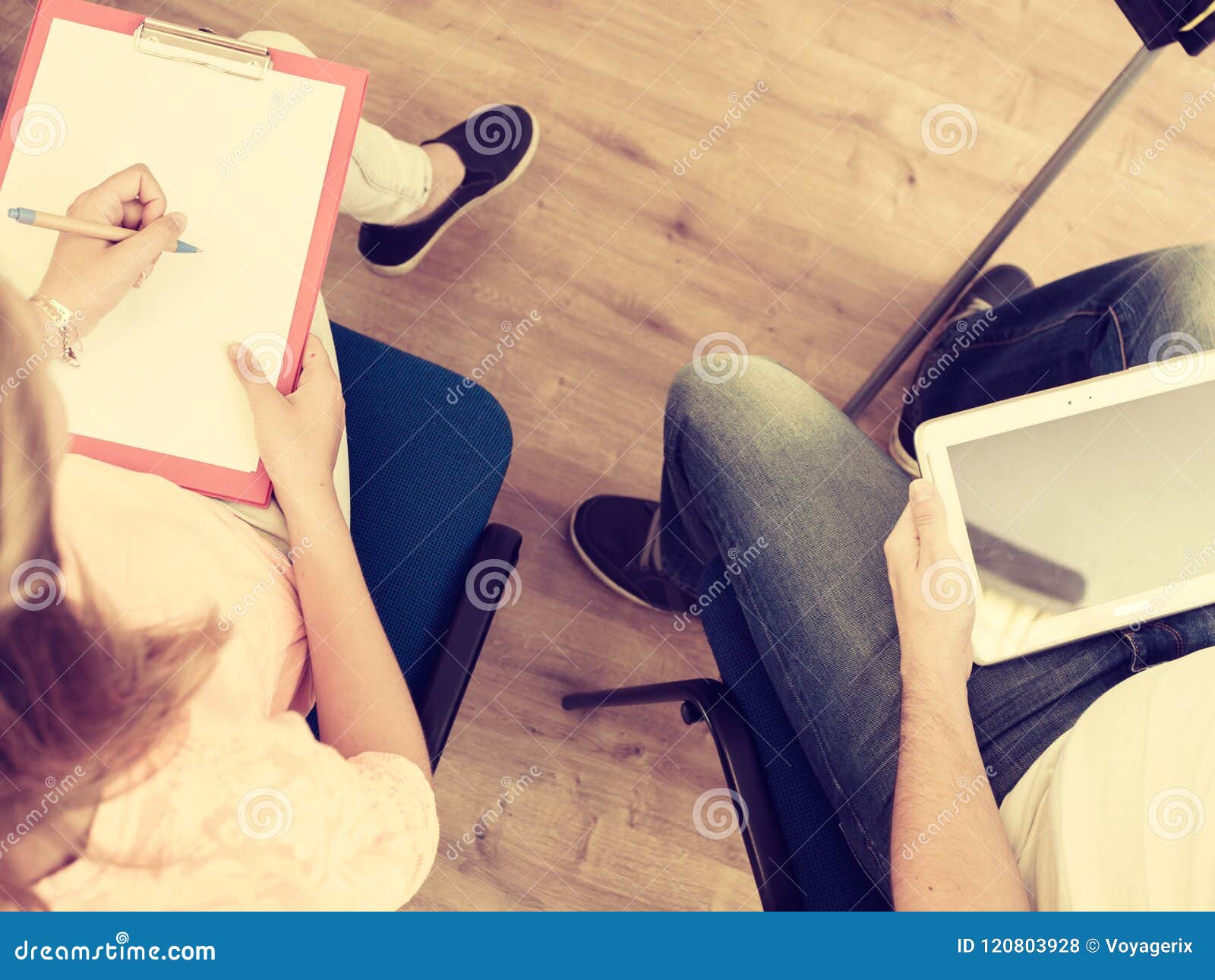 Two People Using Tablet and Note Pad Stock Photo - Image of digital ...