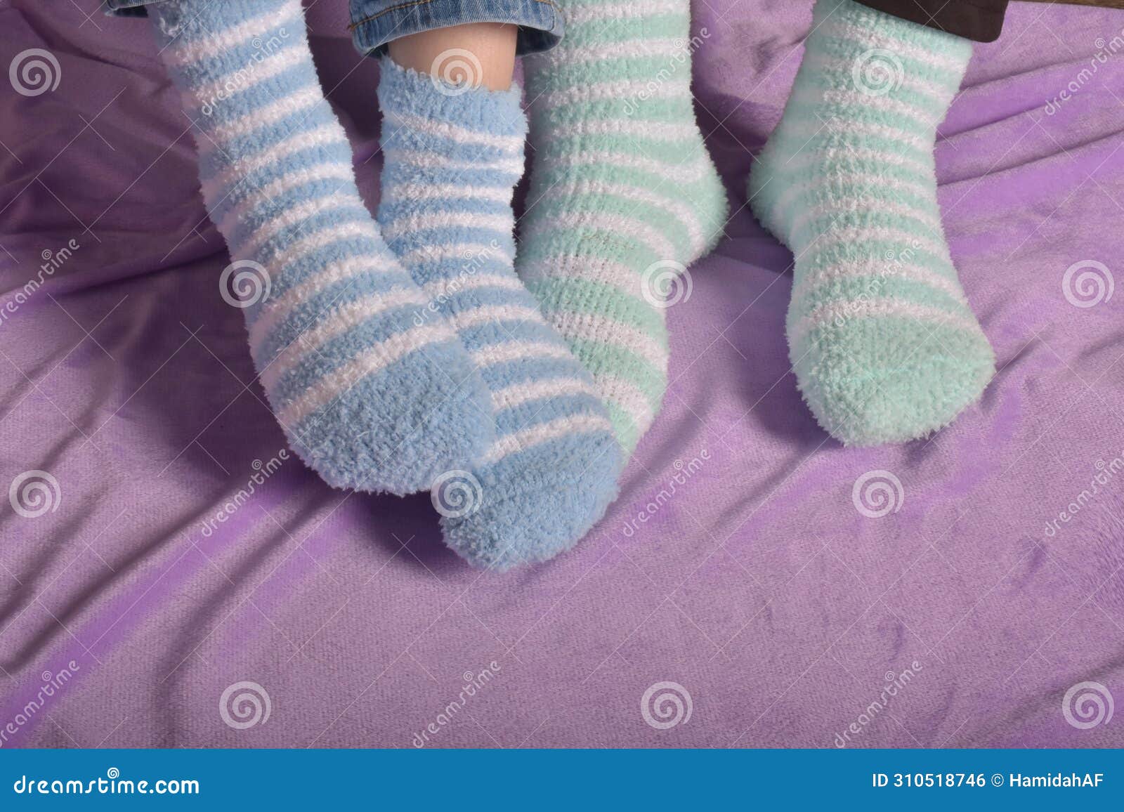 Two people wearing socks stock photo. Image of socks - 310518746