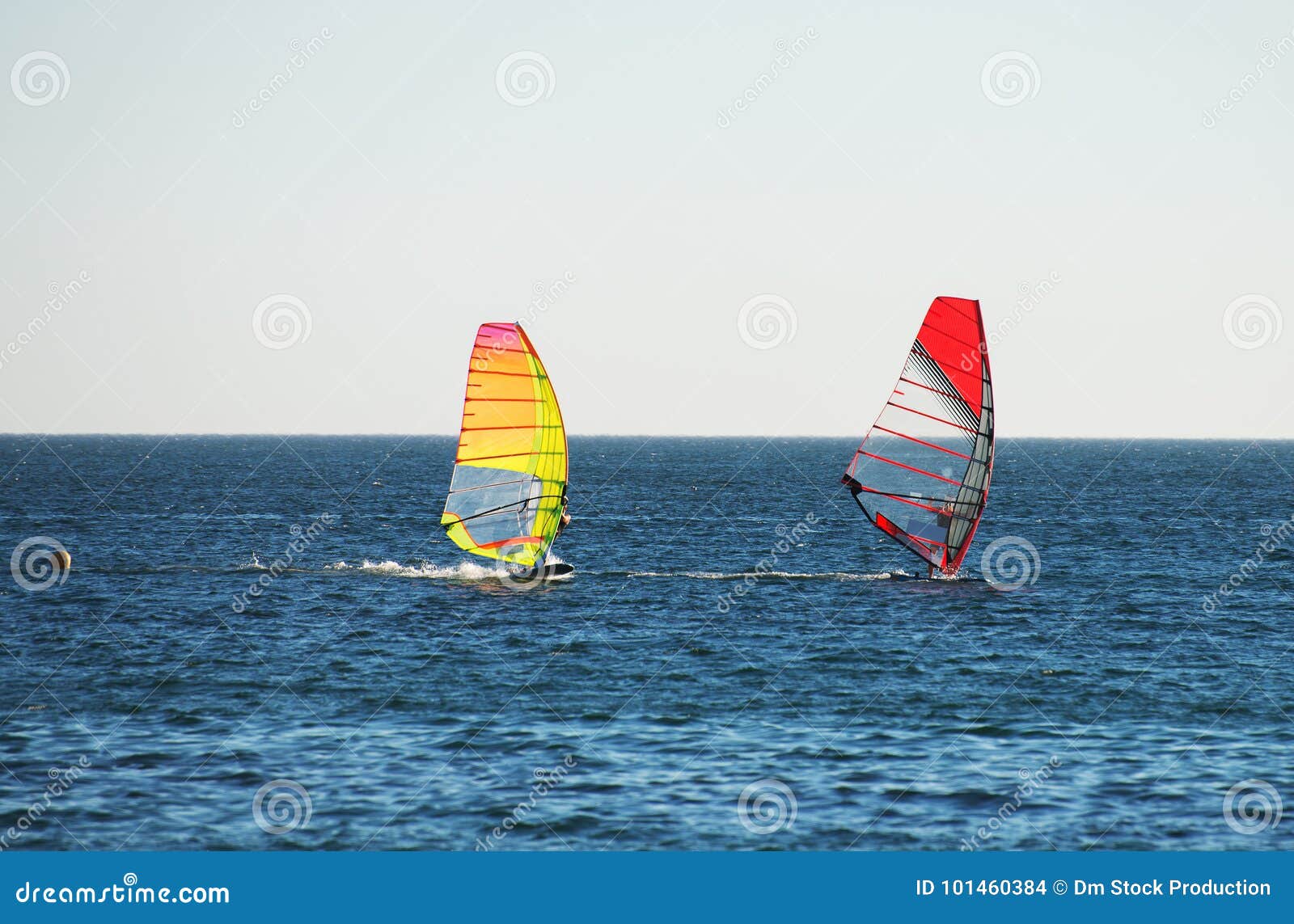 Two people windsurfing. stock photo. Image of exercise - 101460384