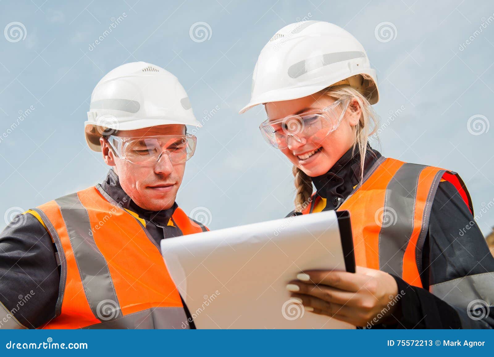 Two people working stock image. Image of male, industry - 75572213