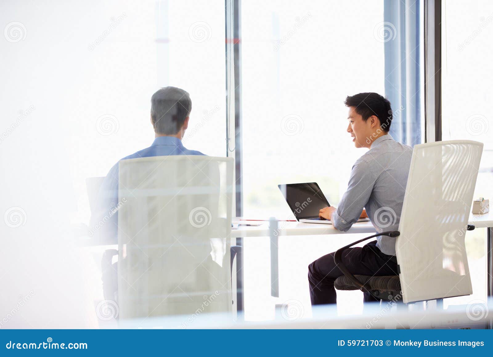 Two People Working in a Modern Office Stock Image - Image of career ...