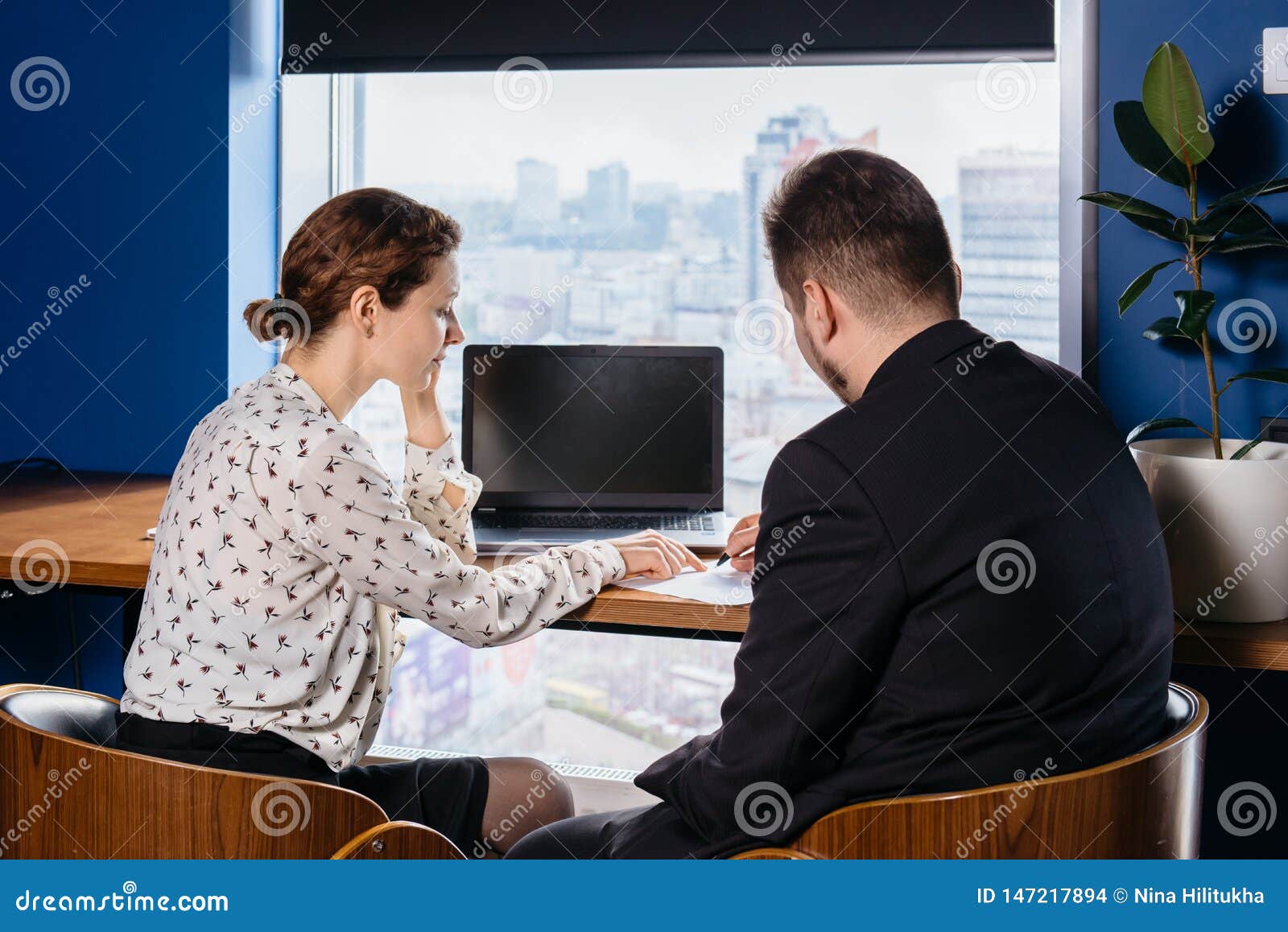 Two People Working at the Office. Client and Manager Conversation Stock ...