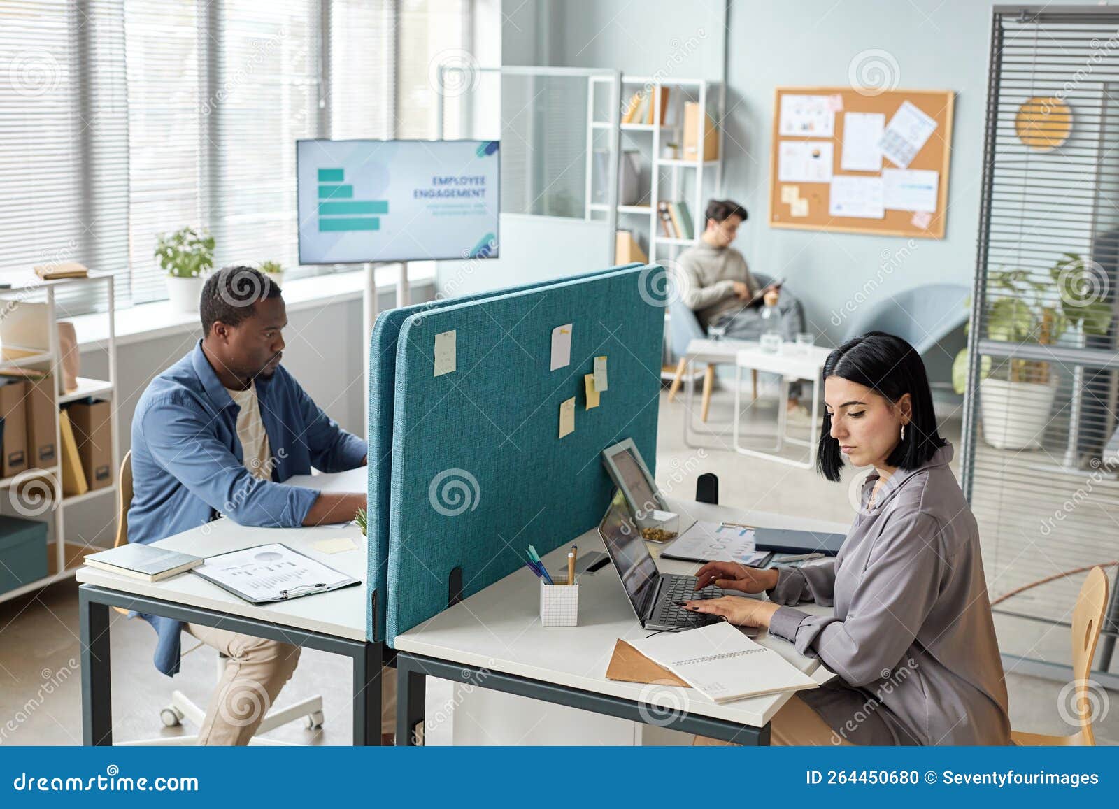 Two People Working in Office Separated by Partition Wall Stock Photo ...