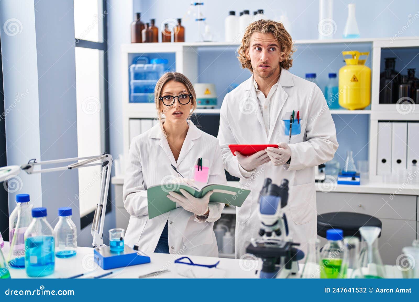 Two People Working at Scientist Laboratory Clueless and Confused ...