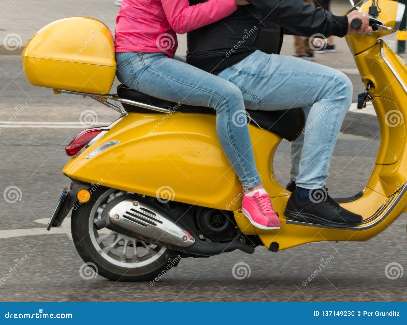Two People Riding a Yellow Scooter Stock Photo - Image of freedom ...
