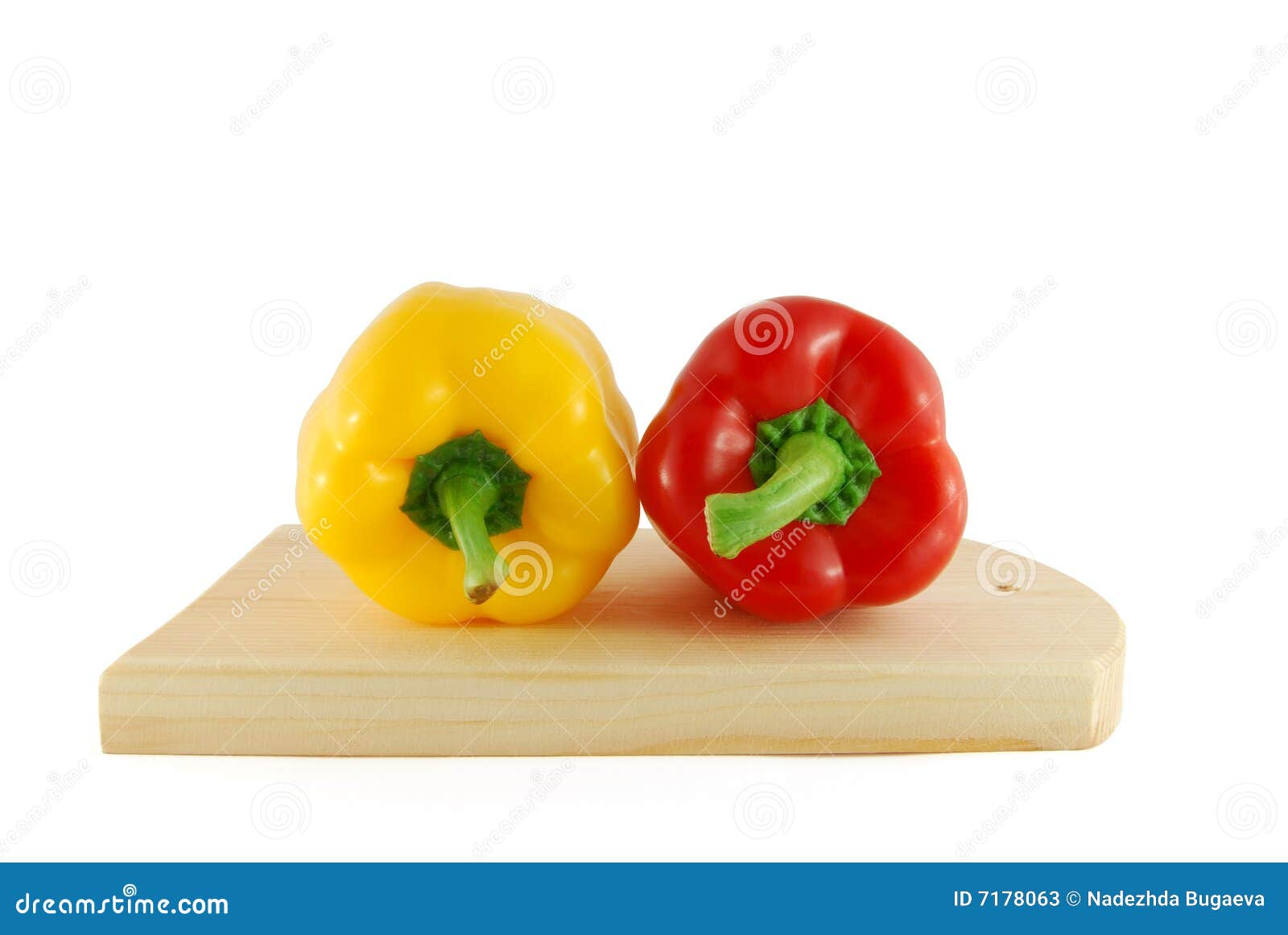 Two peppers on the board stock image. Image of isolated - 7178063