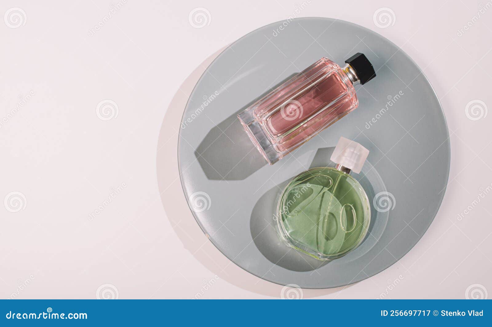 Two Perfume Bottles on a Grey Plate Stock Image - Image of watercolor ...