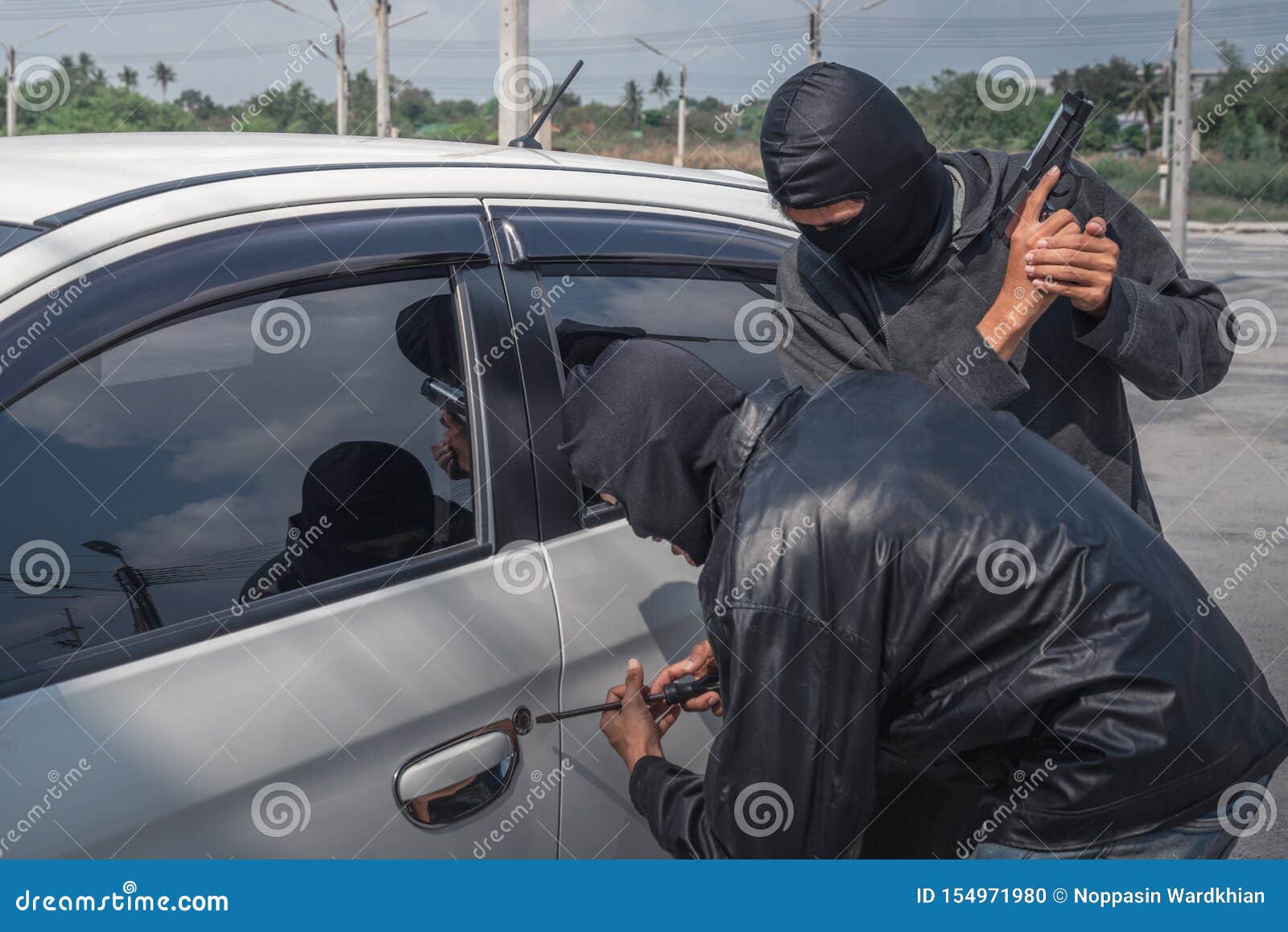 Two Person are Taking Aim at the in of Car Stock Photo - Image of ...