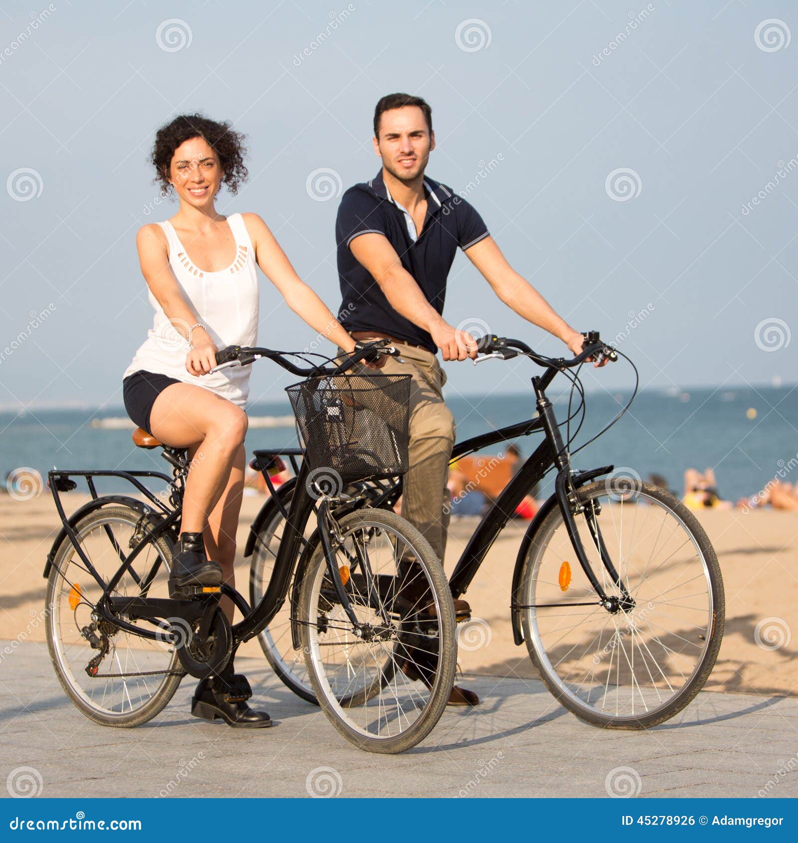 Two Persons Cycling on the Coast Stock Photo - Image of cheerful ...