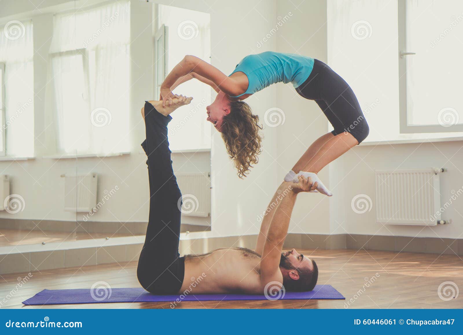 Two Persons are Doing Acro-yoga Indoors Stock Image - Image of mind ...