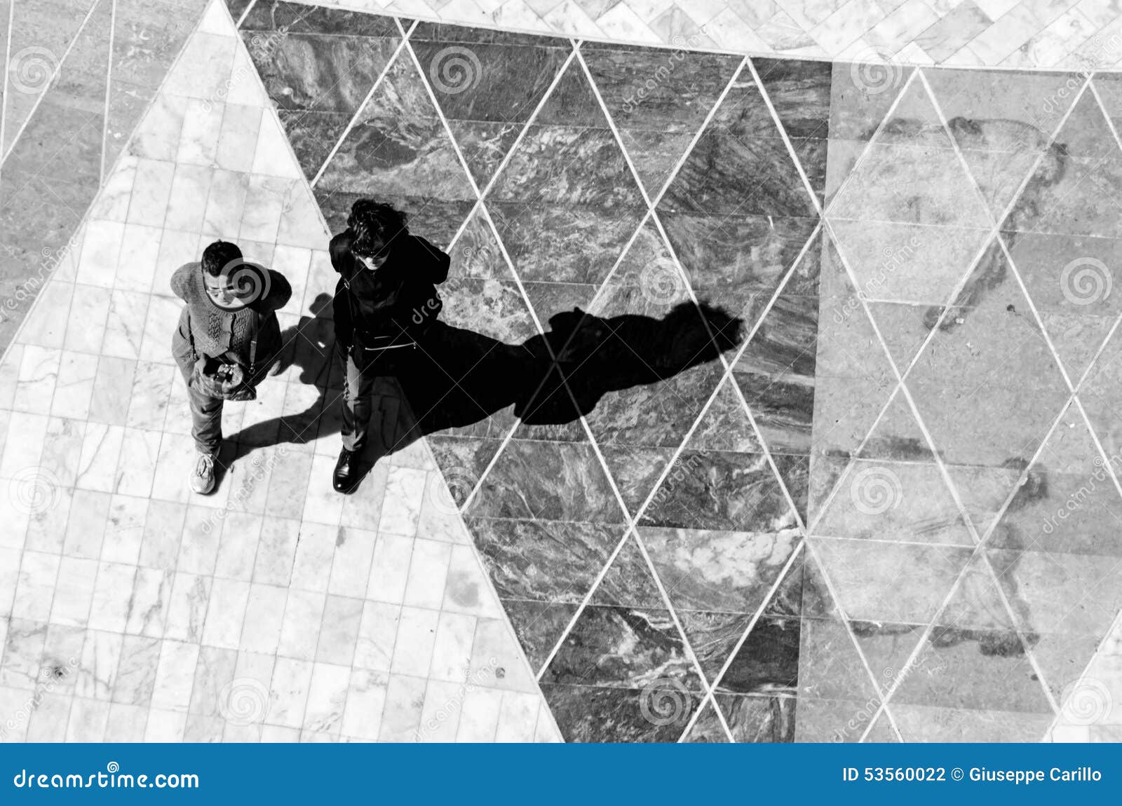 Two Persons Walking Down the Square Editorial Photography - Image of ...