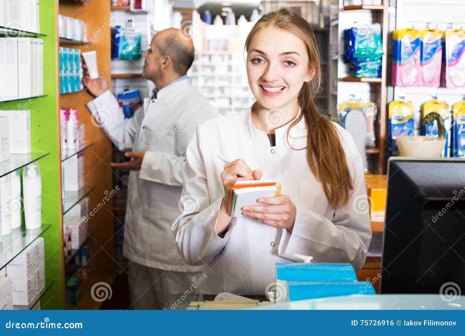 Two Pharmacists in Chemist Shop Stock Photo - Image of helping ...