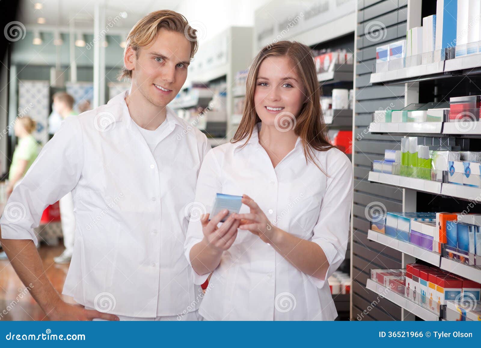 Two Pharmacists Consulting Each Other Stock Photo - Image of cheerful ...