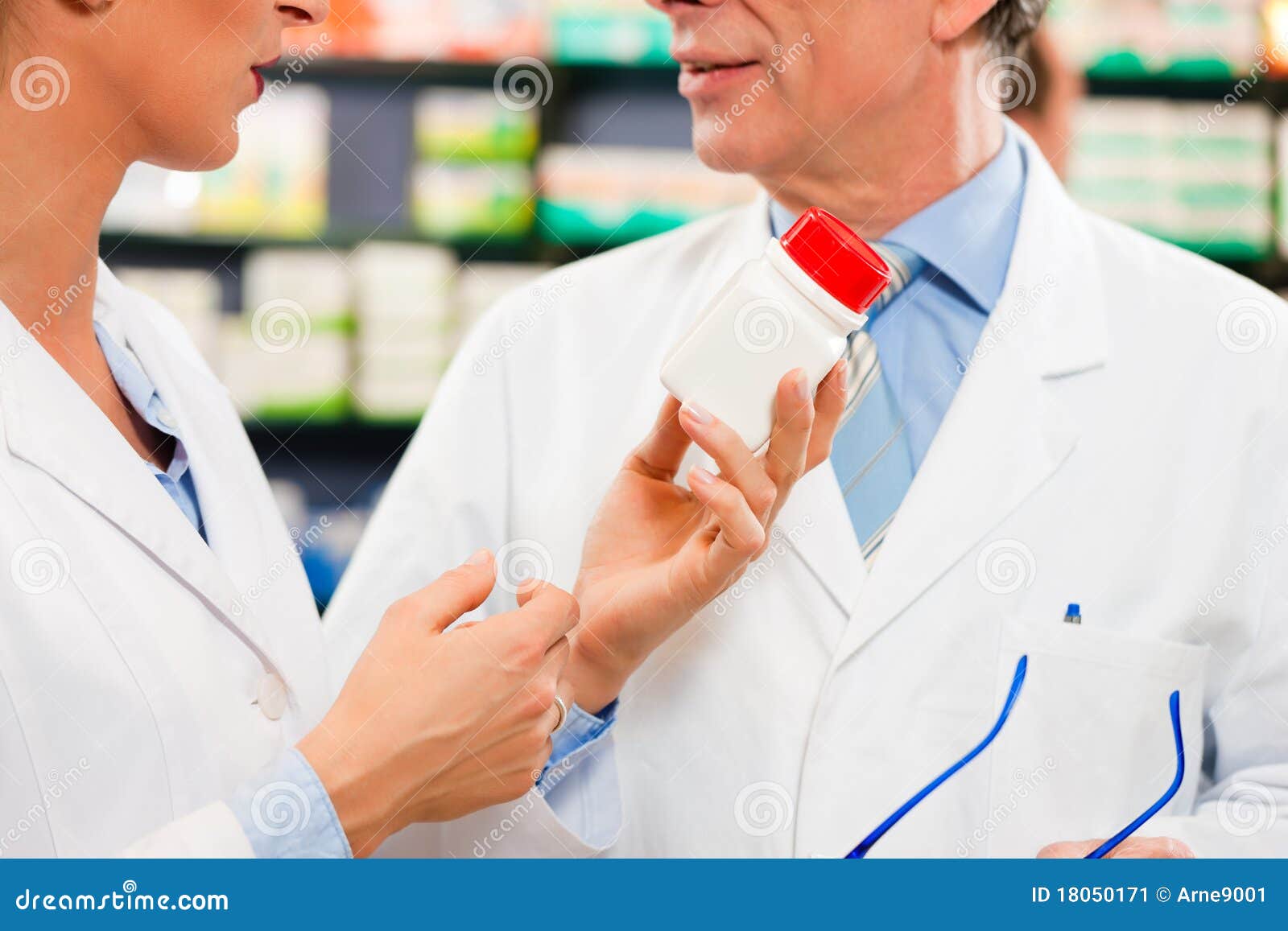 Two Pharmacists in Pharmacy Consulting Stock Image - Image of caucasian ...