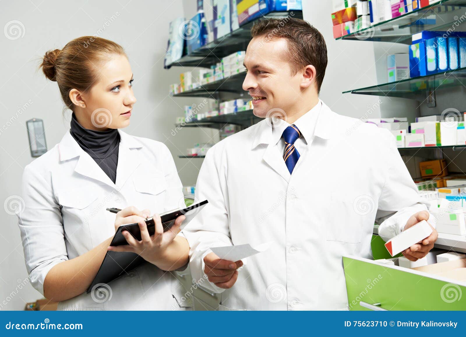 Two Pharmacy Chemist Workers in Drugstore Stock Photo - Image of ...