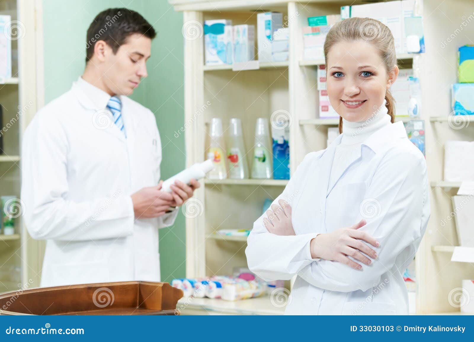 Two Pharmacy Chemist Workers in Drugstore Stock Image - Image of girl ...