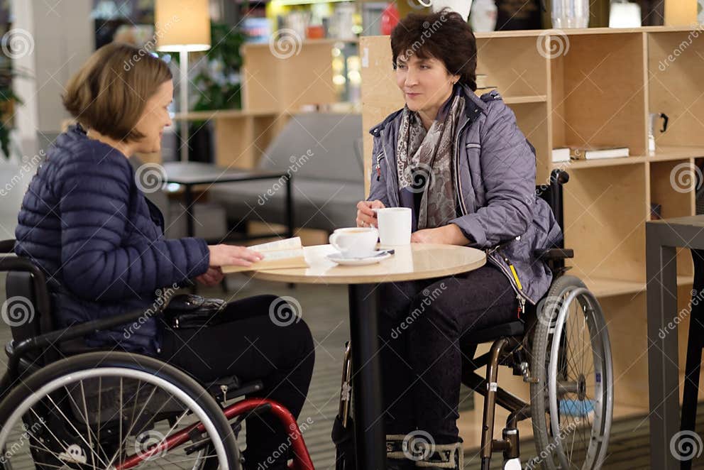 Two Physically Challenged Women in a Cafe Stock Image - Image of cafe ...