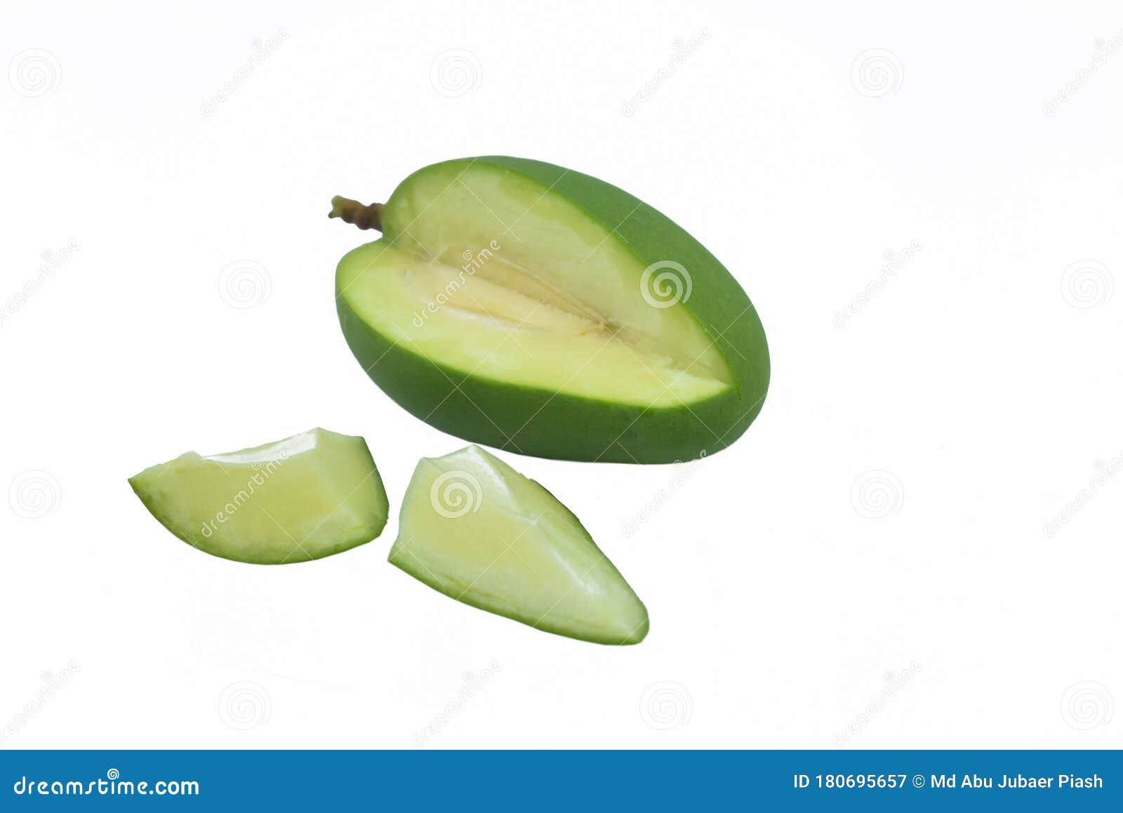 Two Piece of a Sliced Mango Placed beside the Rest of the Pieces of the ...