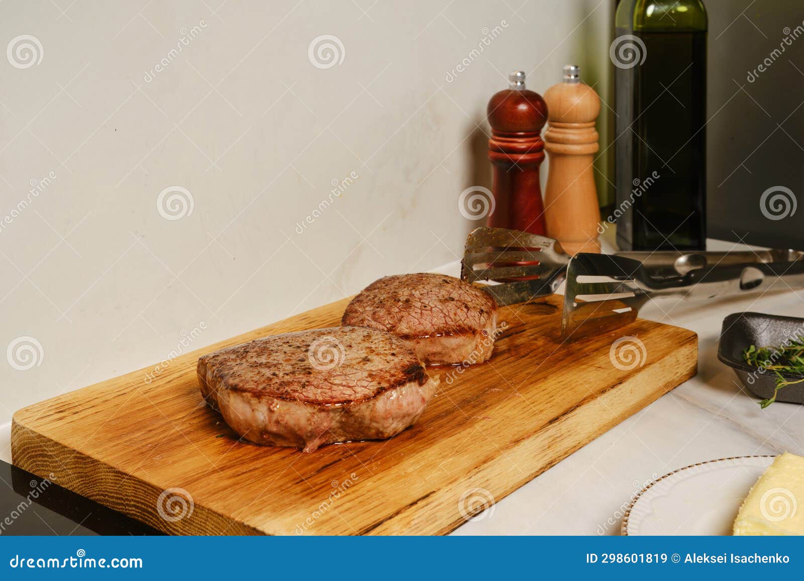 Two Pieces of Beef Steak Rest on Wooden Cutting Board Stock Image ...