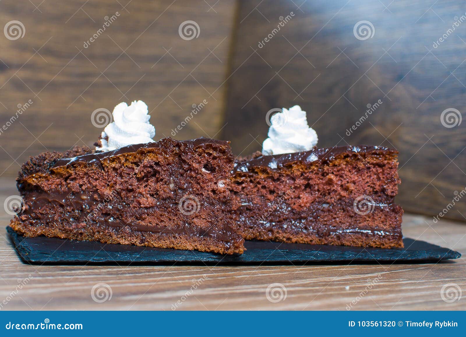 Two Pieces of Cake on a Stone Plate Stock Photo - Image of food ...