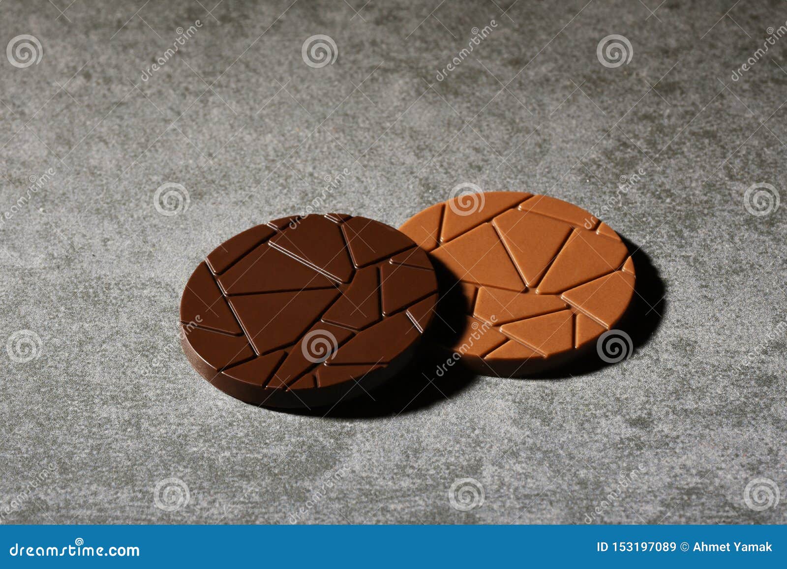 Two Pieces, Circle Shape Dark and Milk Chocolate on Gray Texture Stock ...