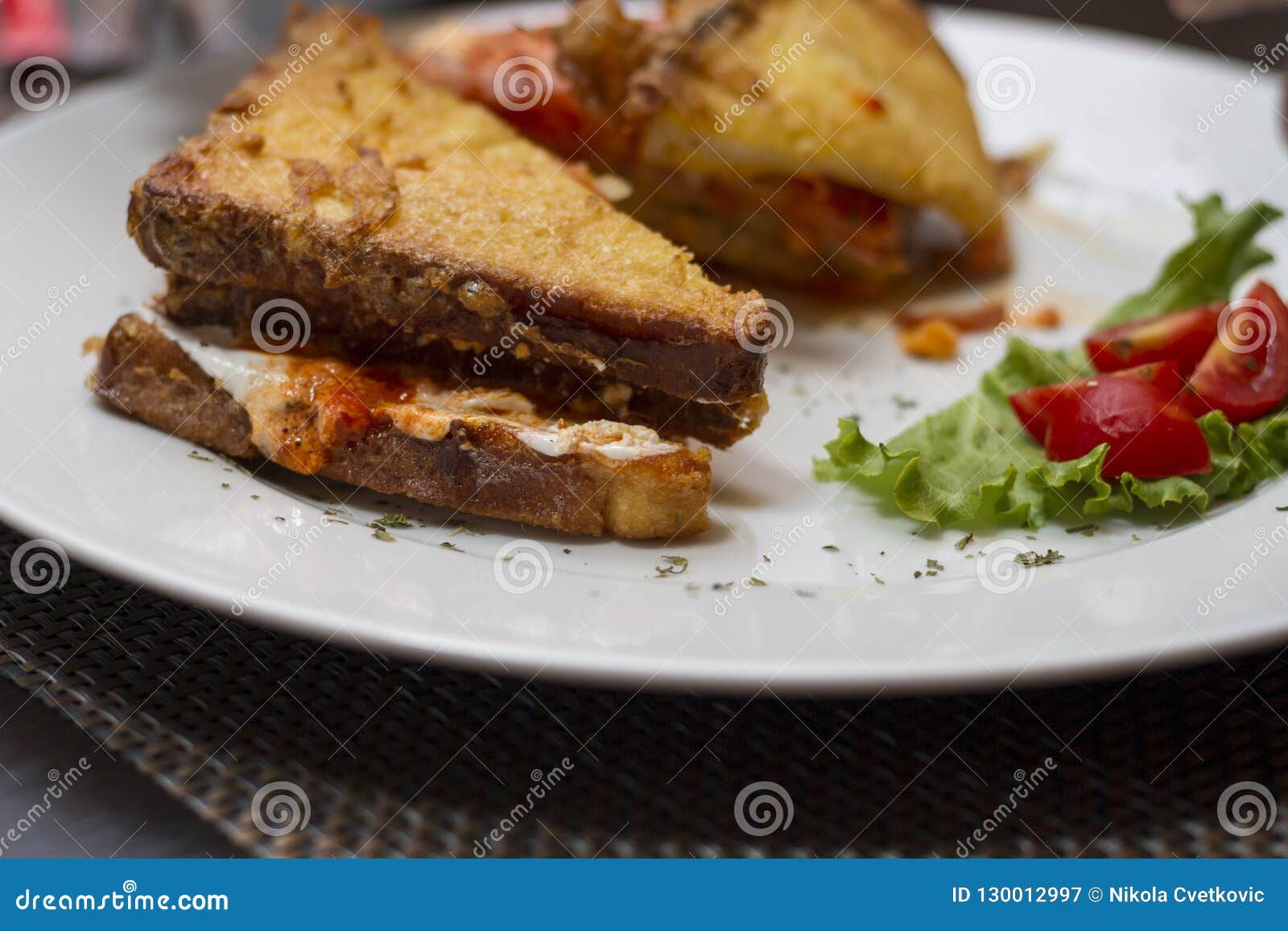 Breakfast on a white plate stock image. Image of sandwich - 130012997