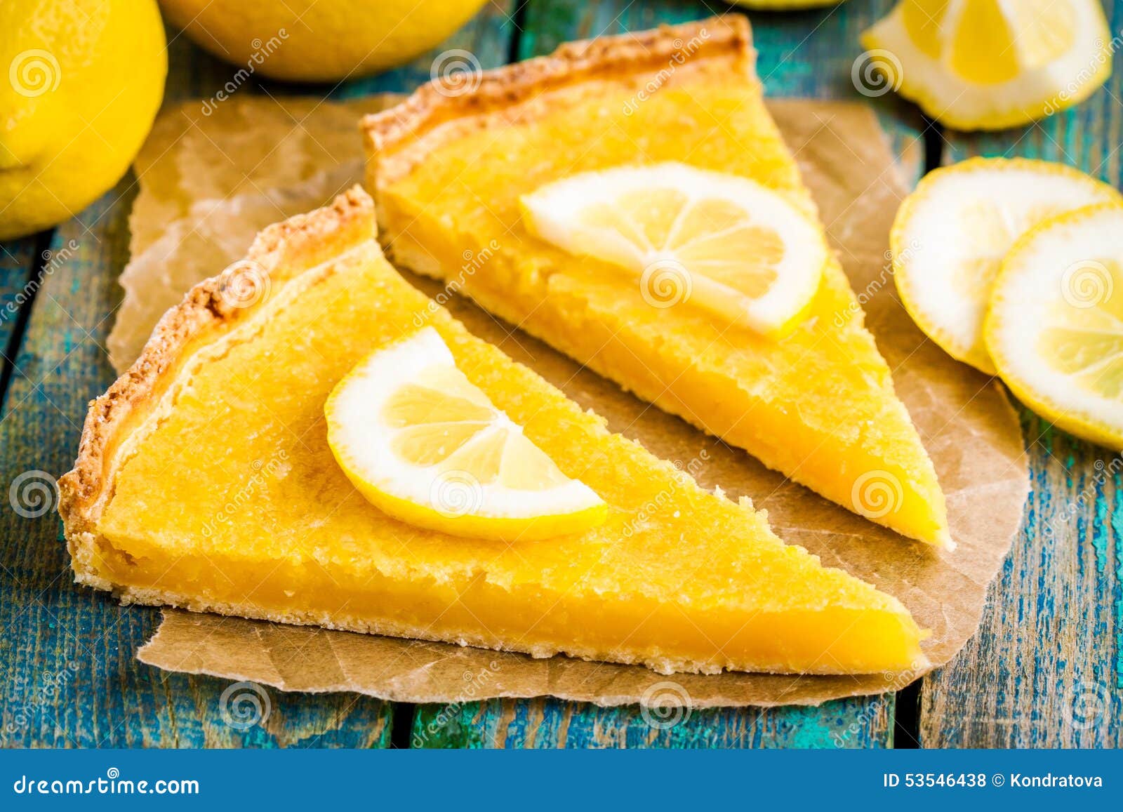 Two Pieces of Lemon Tart with Slice of Lemons Closeup Stock Photo ...