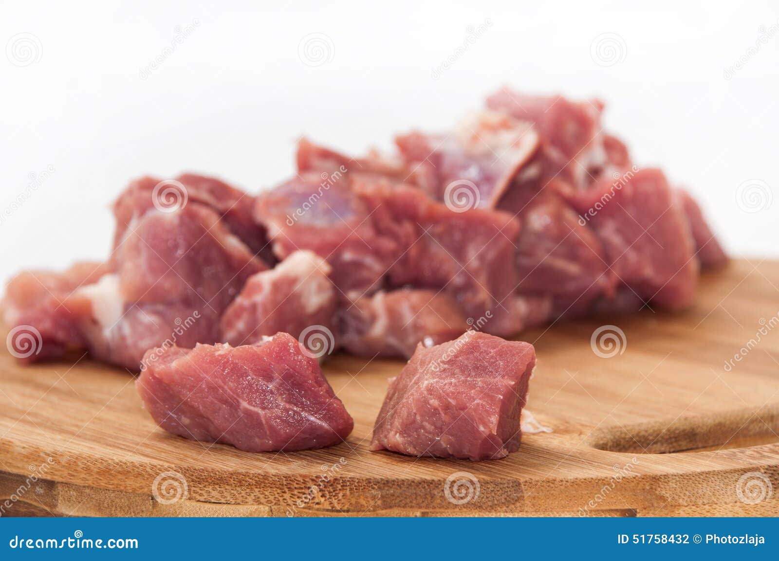 Two Pieces of Meat in Focus Ahead of the Crowd in the Background Stock ...