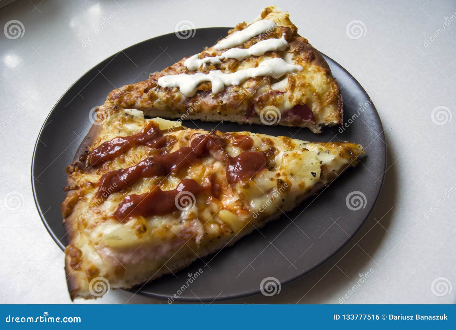 Two Pieces of Pizza on a Plate Stock Photo - Image of cuisine ...