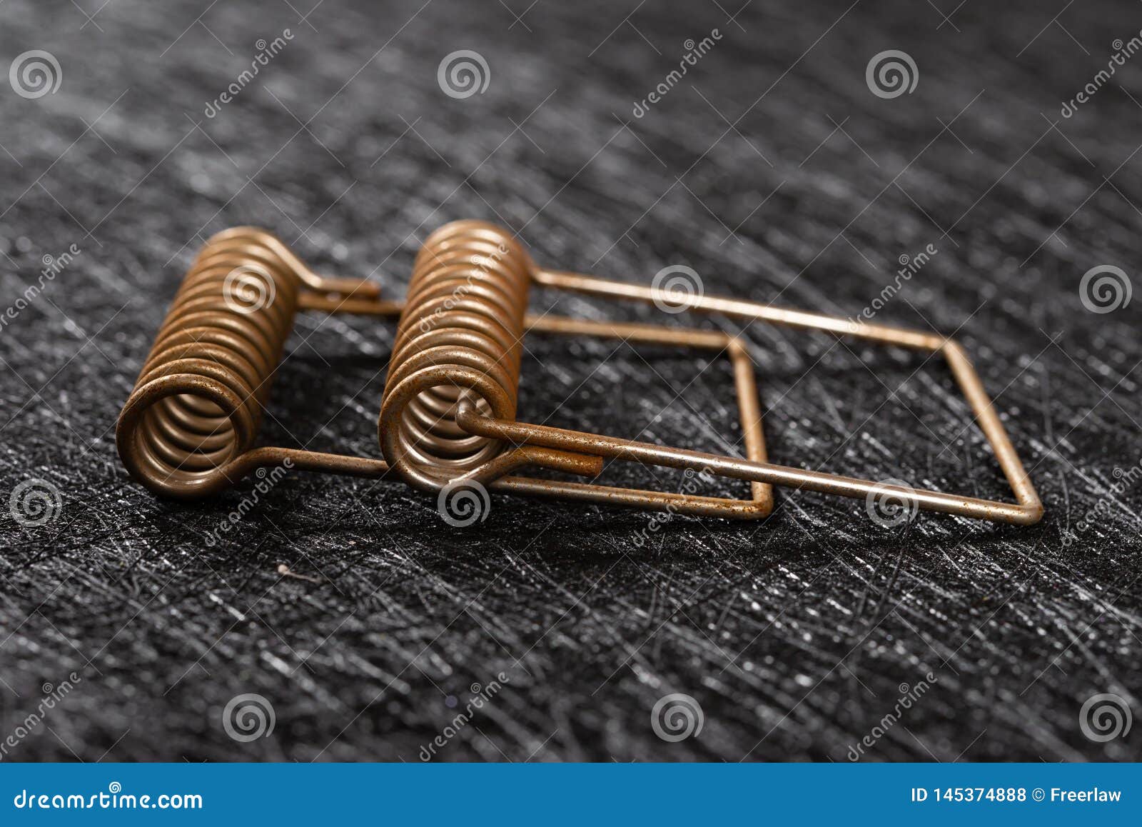 Two Pieces Rusty Springs on Dark Background Stock Photo - Image of ...