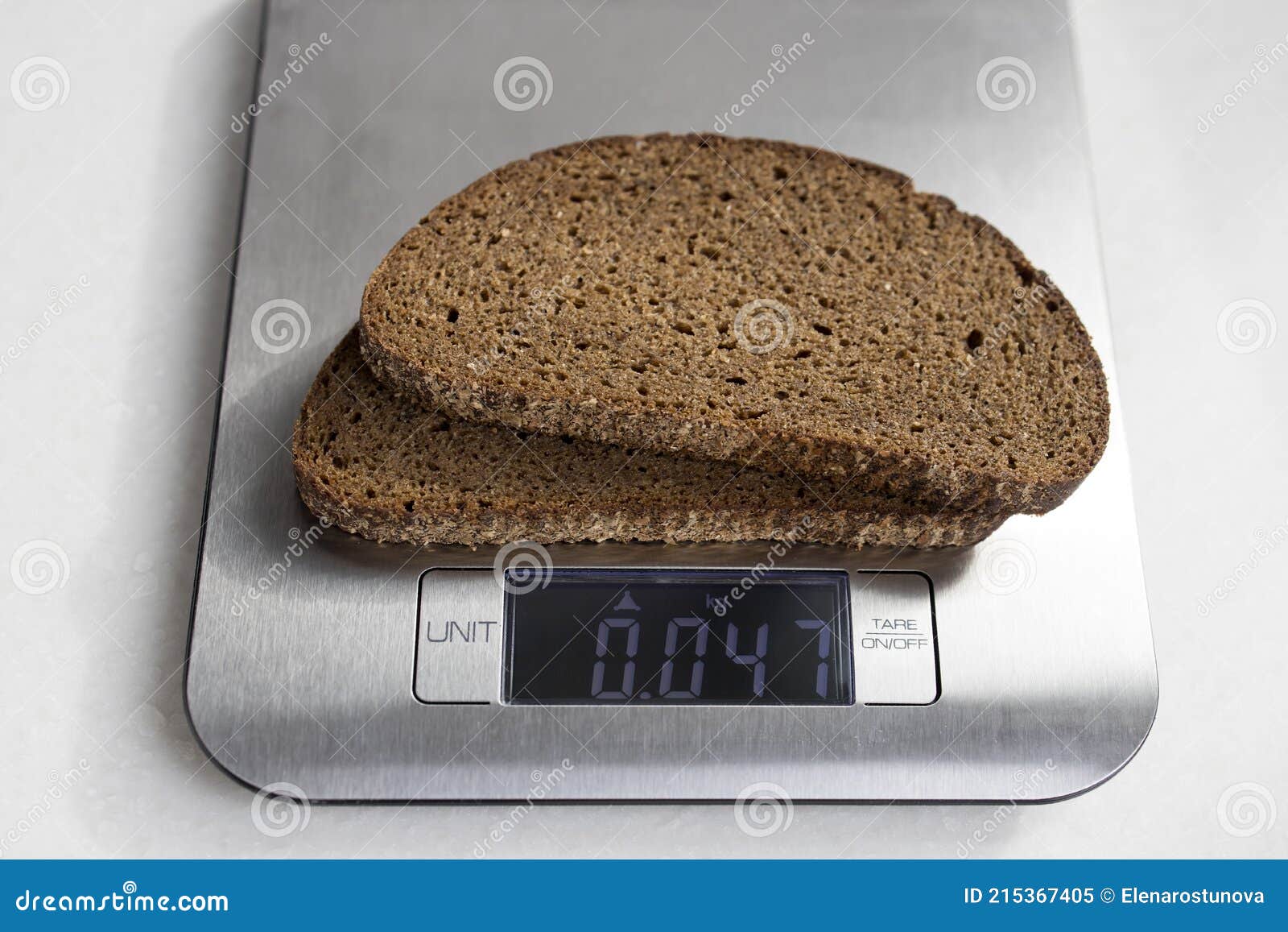 Two Pieces of Rye Bread are Weighed on a Kitchen Scale Stock Image ...