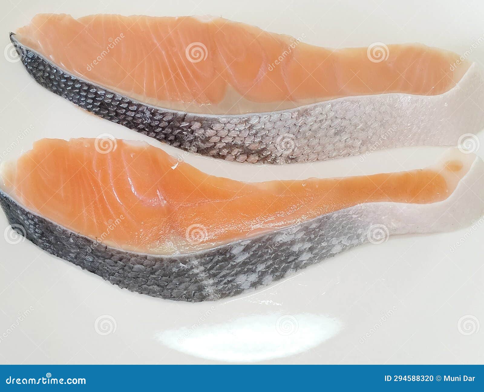 Two Pieces of Salmon Ready To Be Cooked Stock Photo - Image of cooked ...