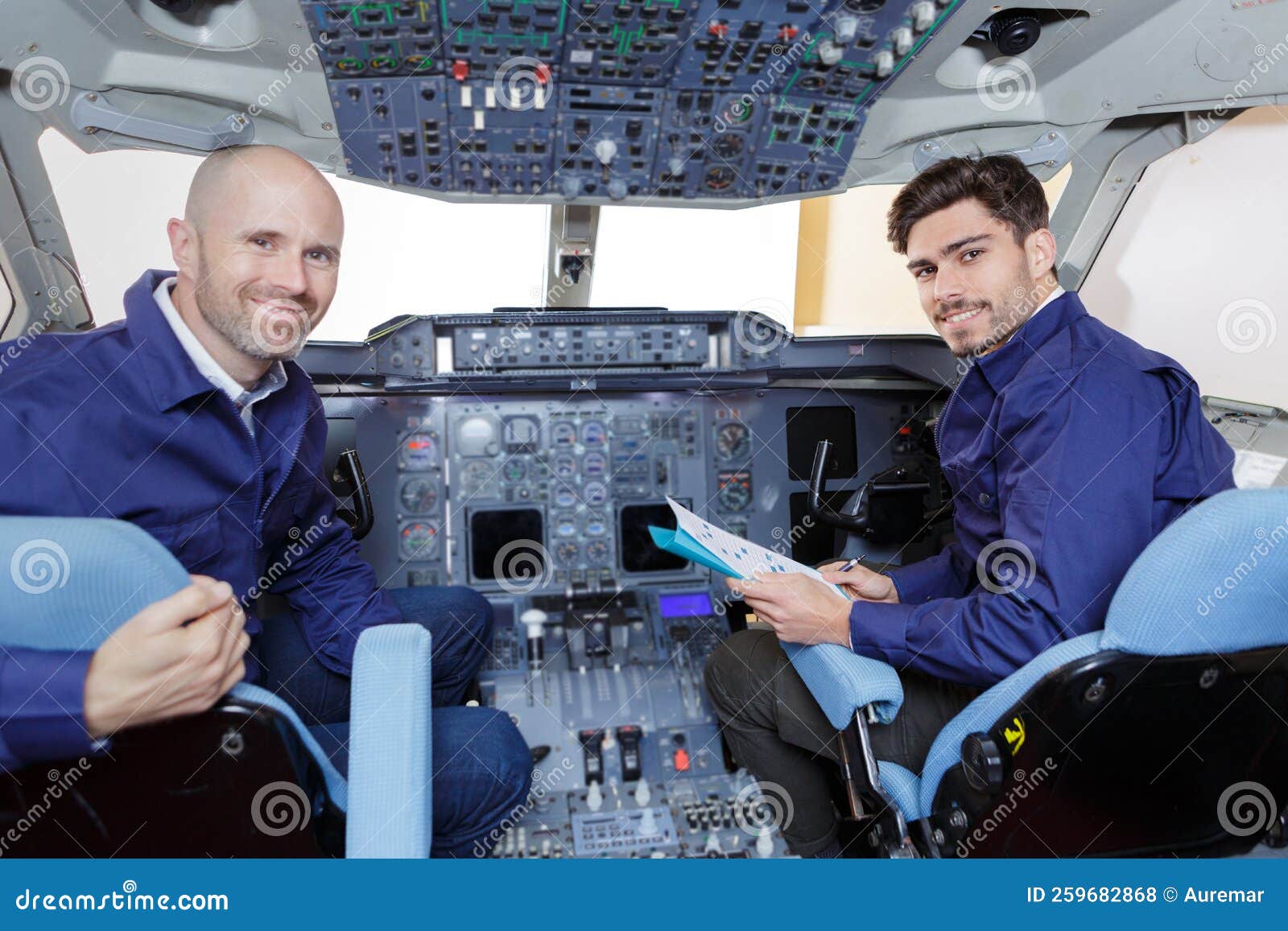 Two Pilots Operate Switches Aircraft System Stock Photo - Image of ...